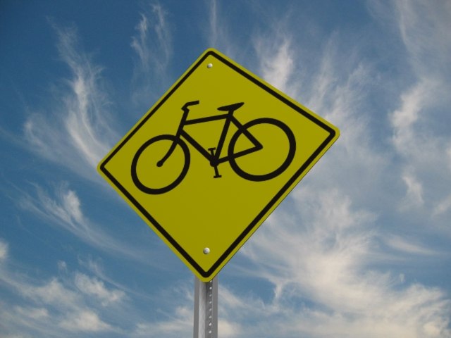 3d bike crossing street sign