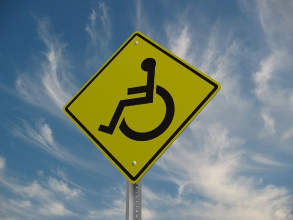 wheelchair crossing street sign max